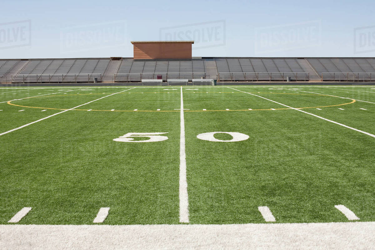 Football field and stadium - Stock Photo - Dissolve