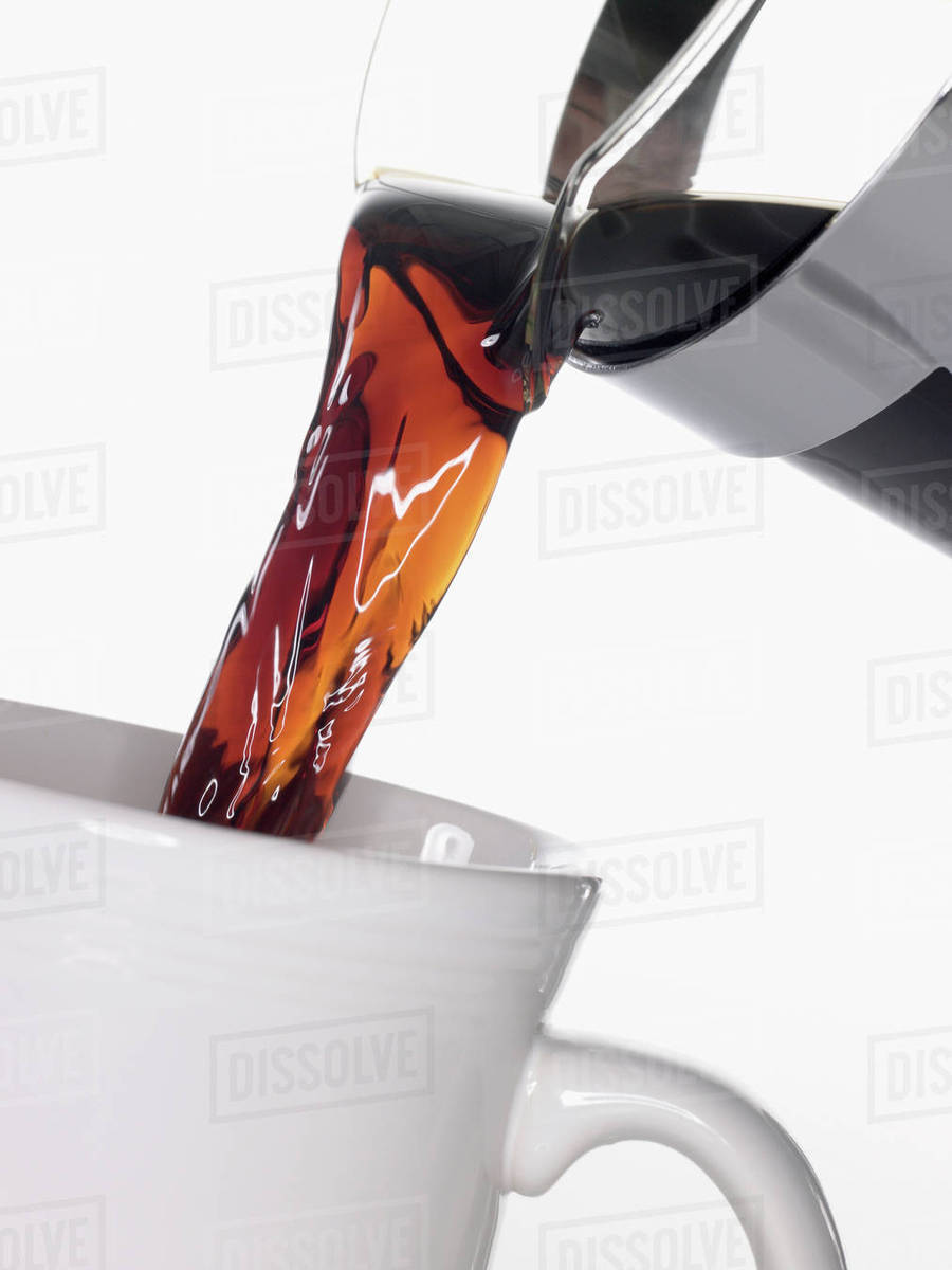 Pouring coffee - Stock Photo - Dissolve