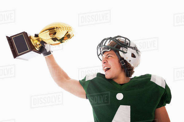 Portrait of American football player celebrating victory - Stock Photo ...