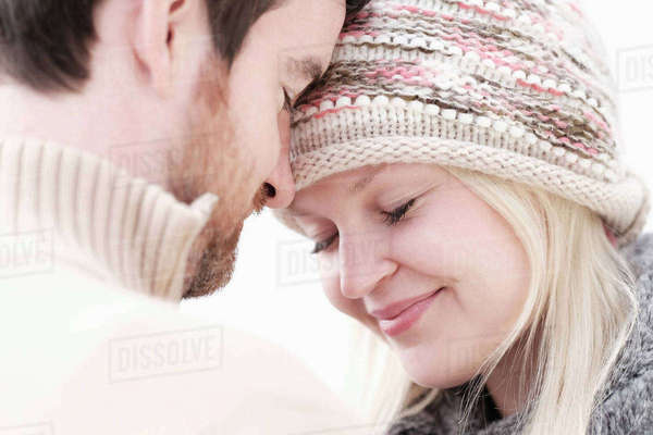 Couple standing face to face - Royalty-free Stock Photo | Dissolve