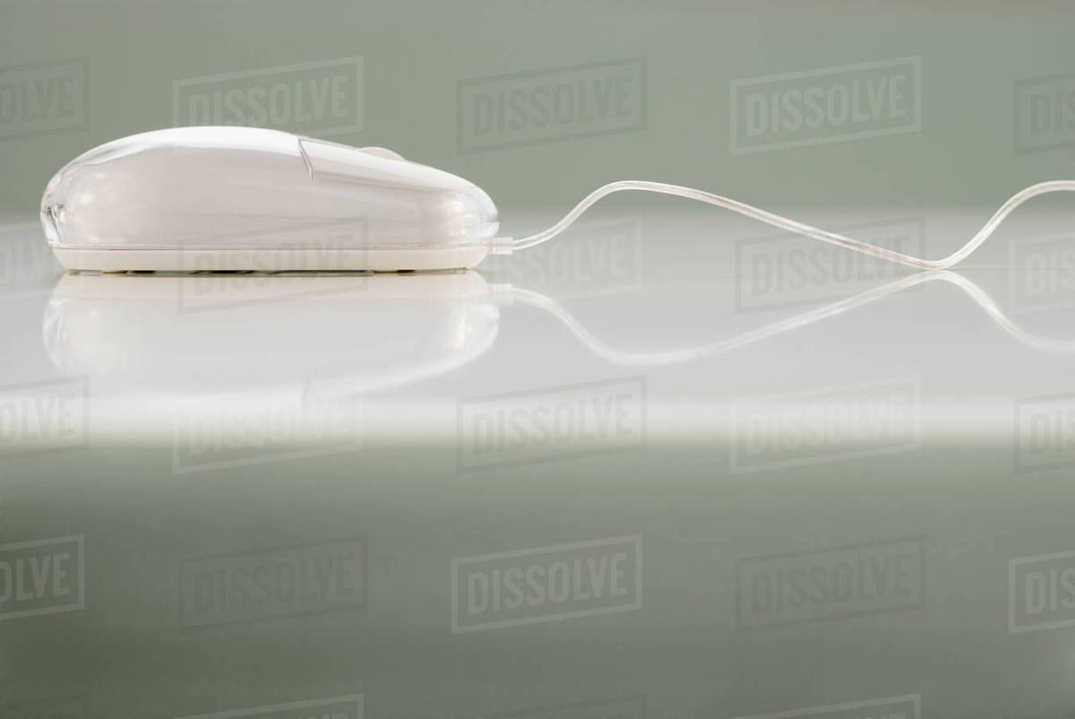 Computer mouse on table - Royalty-free Stock Photo | Dissolve