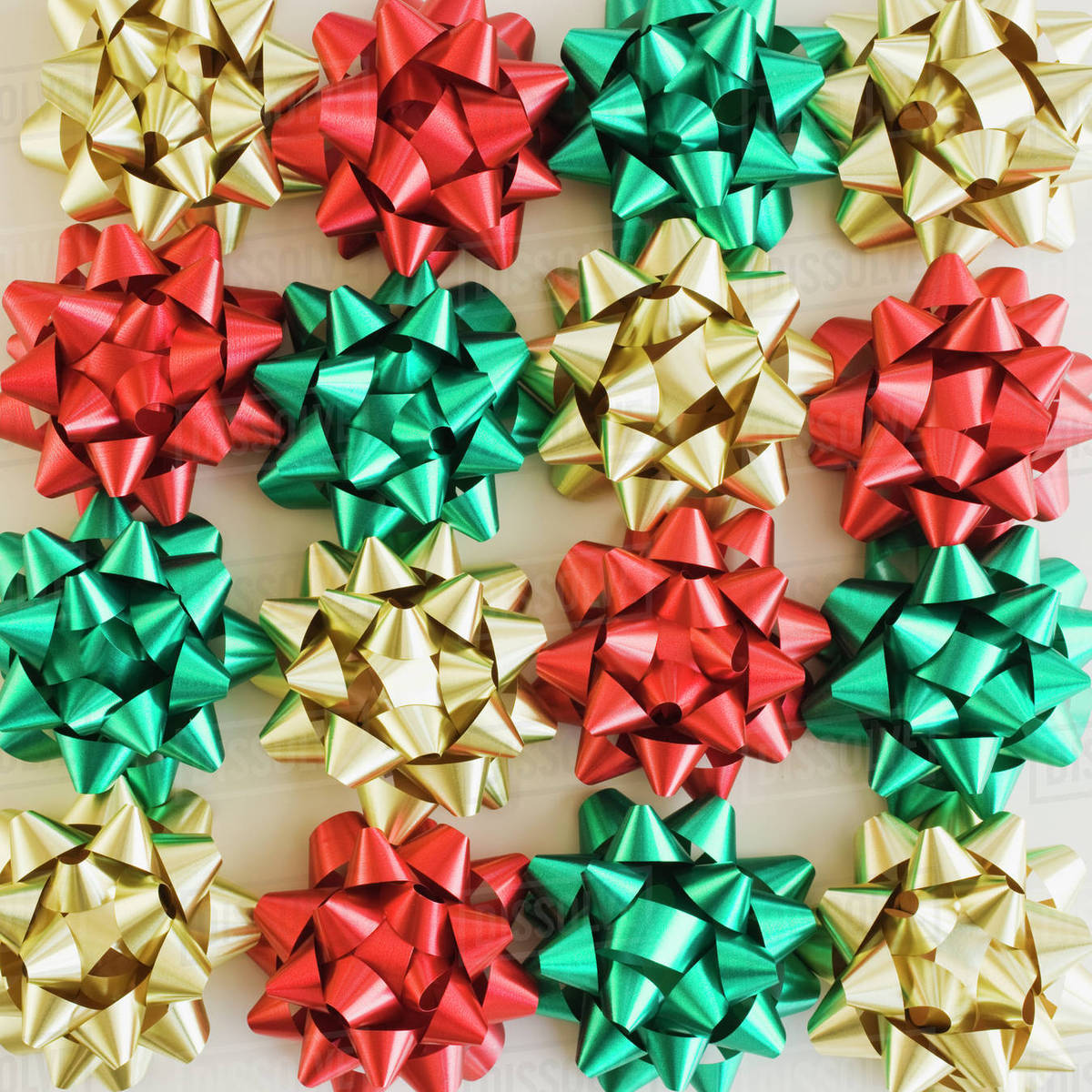 Assorted gift bows in rows - Royalty-free Stock Photo | Dissolve