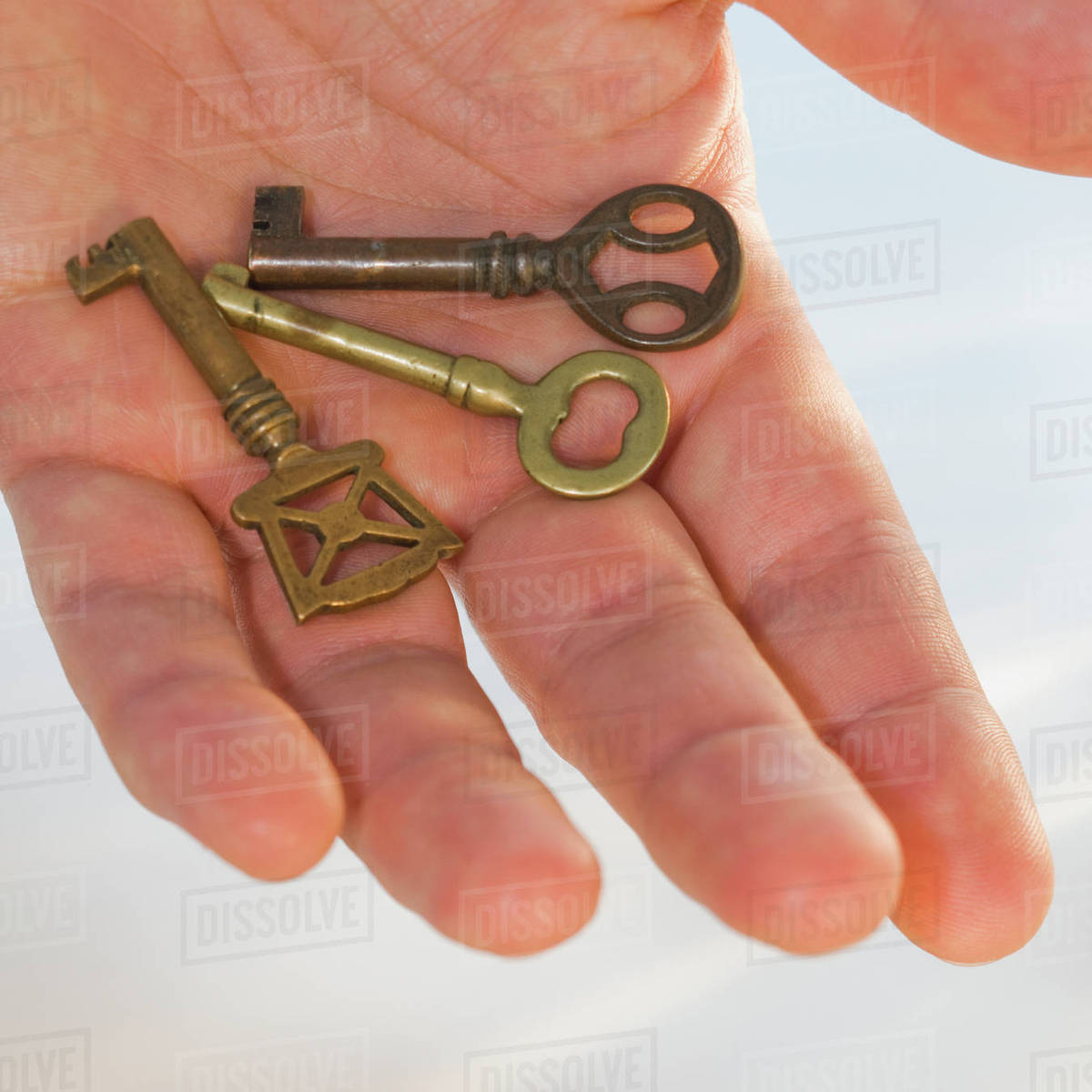 Close up of old fashioned keys in man’s hand - Royalty-free Stock Photo ...