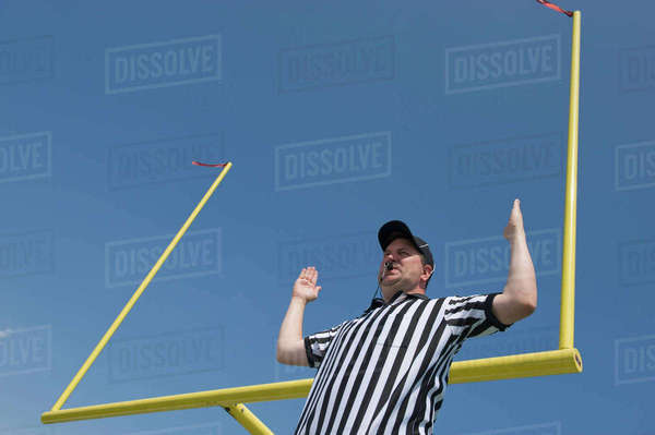 Football referee calling field goal - Royalty-free Stock Photo | Dissolve