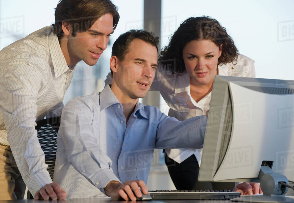 Business people working at computer - Royalty-free Stock Photo | Dissolve