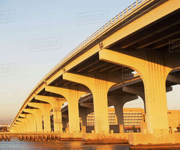 Low angle view of elevated highway over water - Royalty-free Stock ...