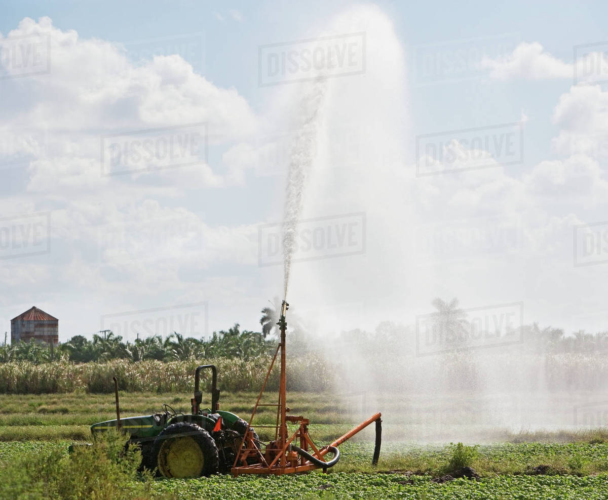 Tractor watering field, Florida, United States - Royalty-free Stock ...