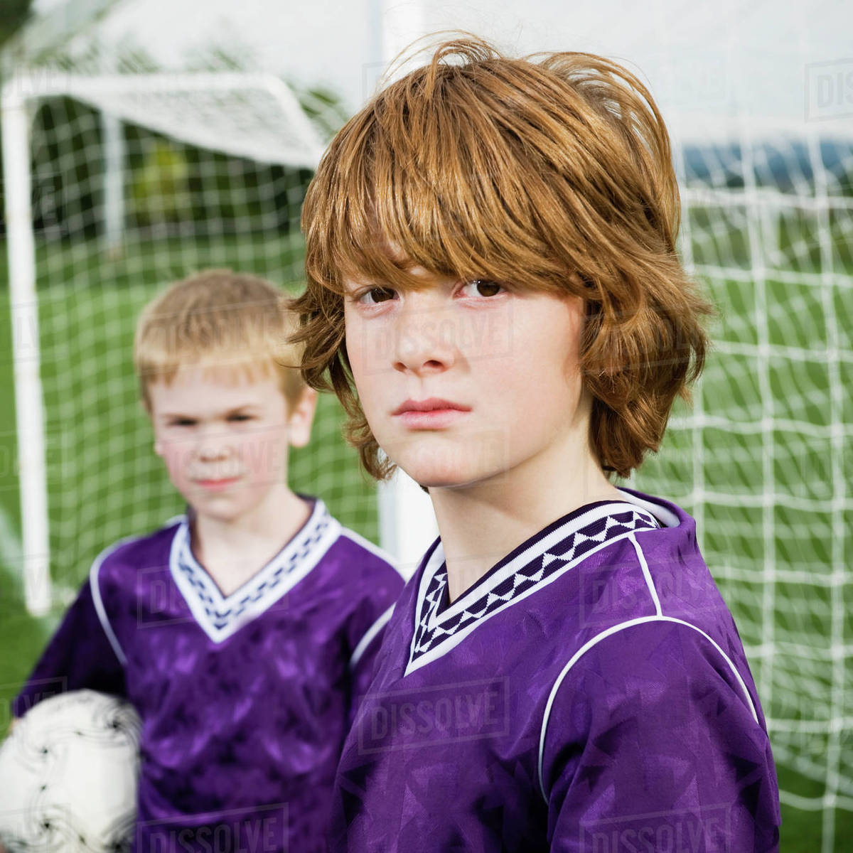 Portrait of boys in soccer uniforms - Stock Photo - Dissolve