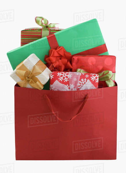 Bag filled with gifts - Stock Photo - Dissolve