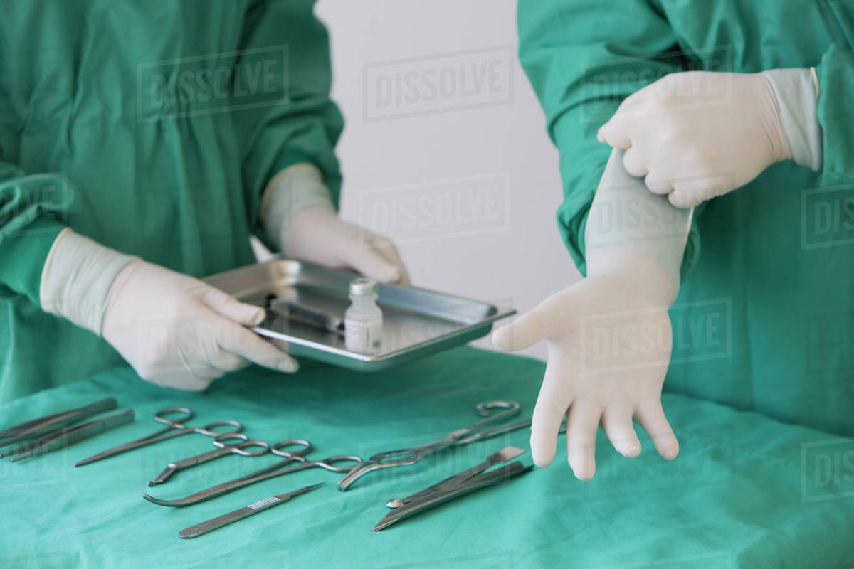 Doctors preparing for surgery - Royalty-free Stock Photo | Dissolve
