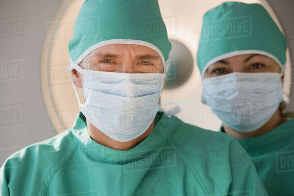 Doctors wearing surgical masks - Royalty-free Stock Photo | Dissolve