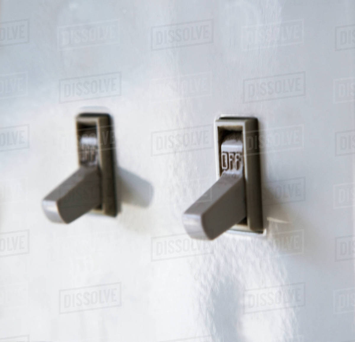 Close up of light switches - Royalty-free Stock Photo | Dissolve