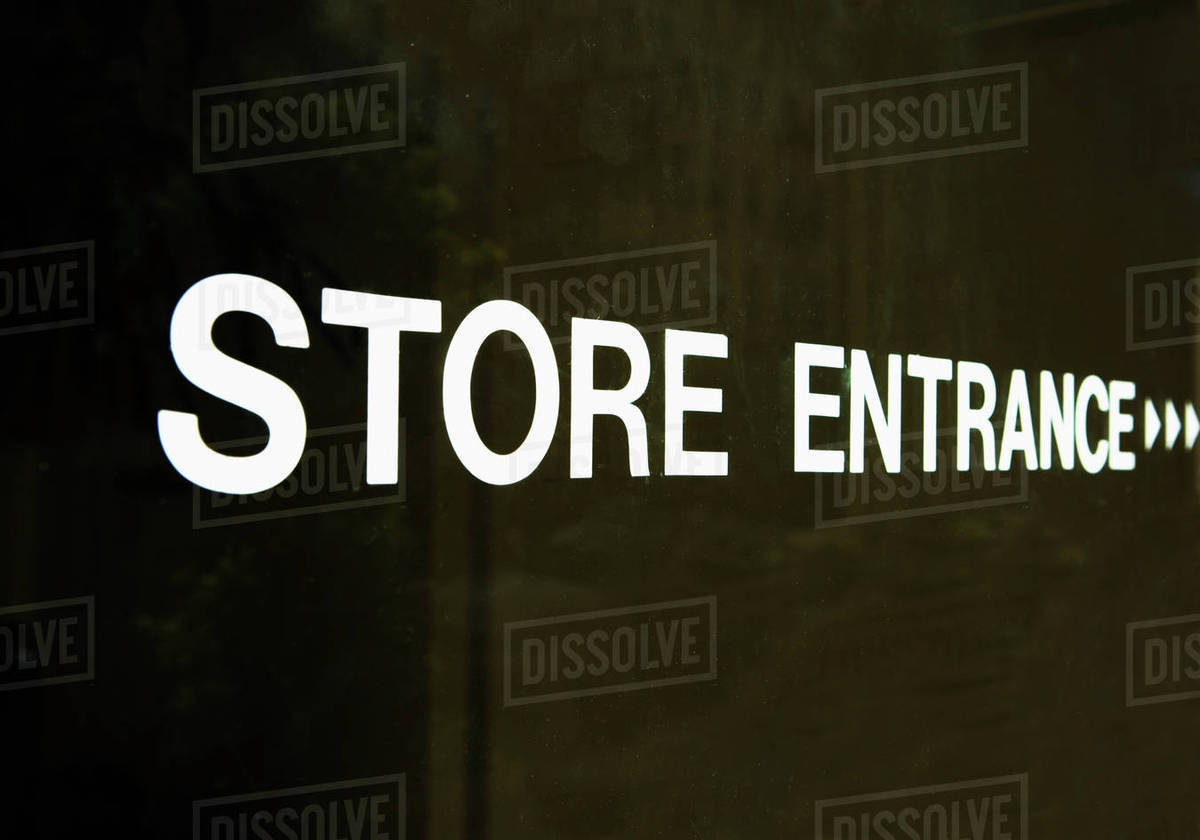 Close up of Store Entrance sign - Royalty-free Stock Photo | Dissolve