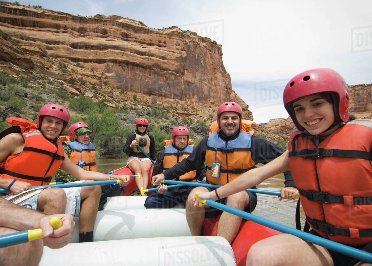 Group of people in raft - Stock Photo - Dissolve