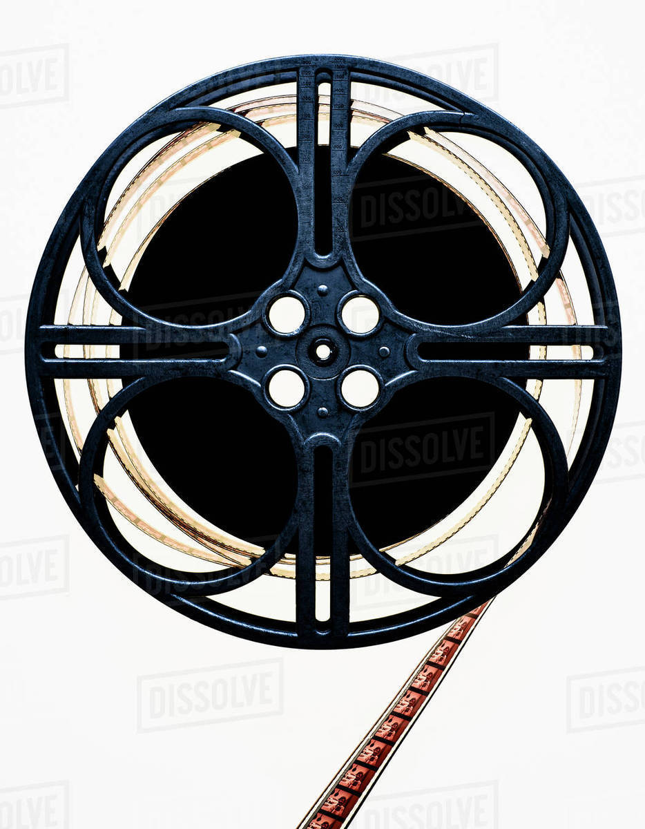 Film reel on white background - Stock Photo - Dissolve