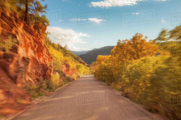 Empty country road at sunset, Colorado - Royalty-free Stock Photo ...