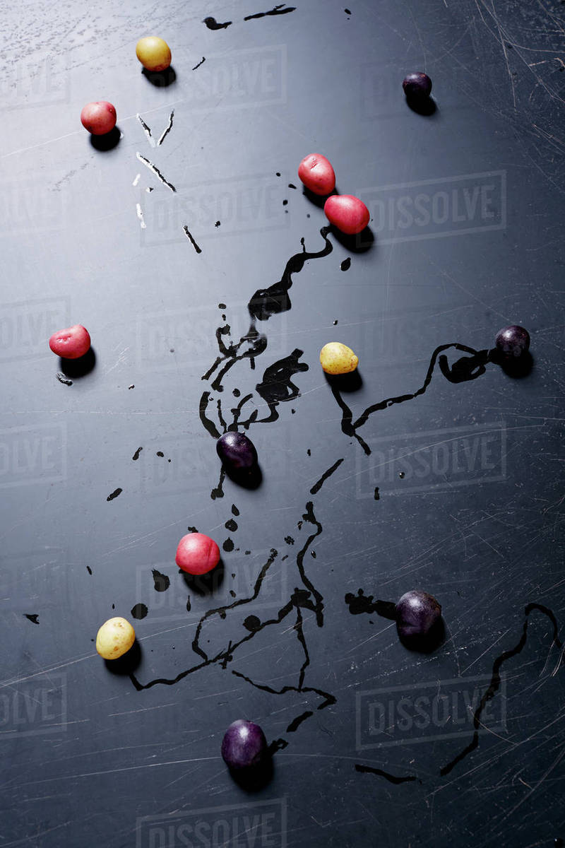 Colorful small potatoes - Stock Photo - Dissolve