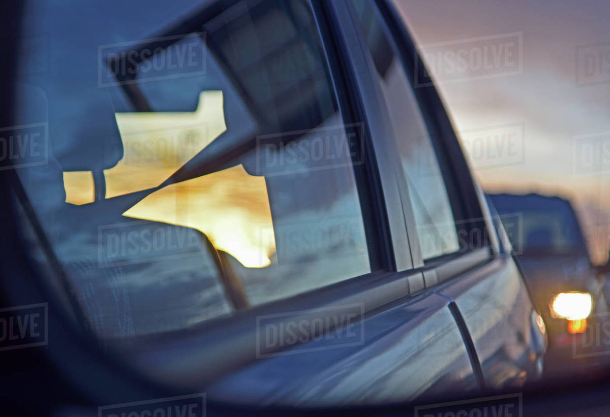 Reflections of city traffic in car's window - Stock Photo - Dissolve