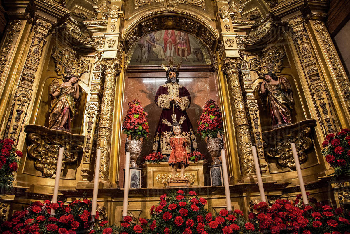 Spain, Seville, Macarena, Ornate altar in Basilica de la Macarena ...