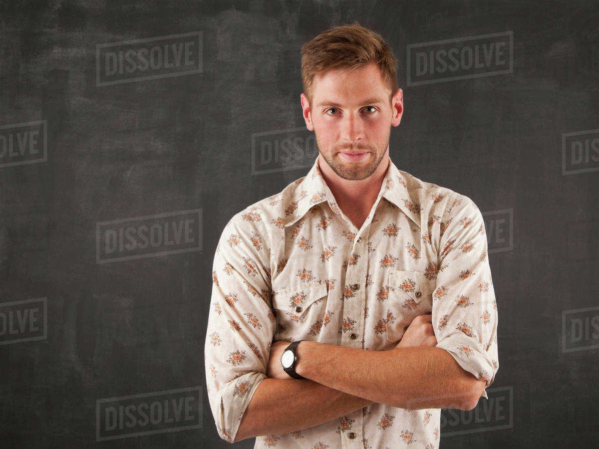 Studio portrait of young man - Royalty-free Stock Photo | Dissolve