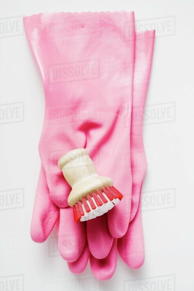 Pink rubber gloves and brush - Royalty-free Stock Photo | Dissolve