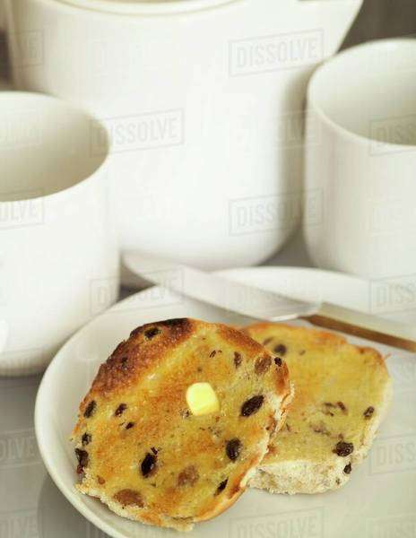 Toasted bun with butter - Royalty-free Stock Photo | Dissolve