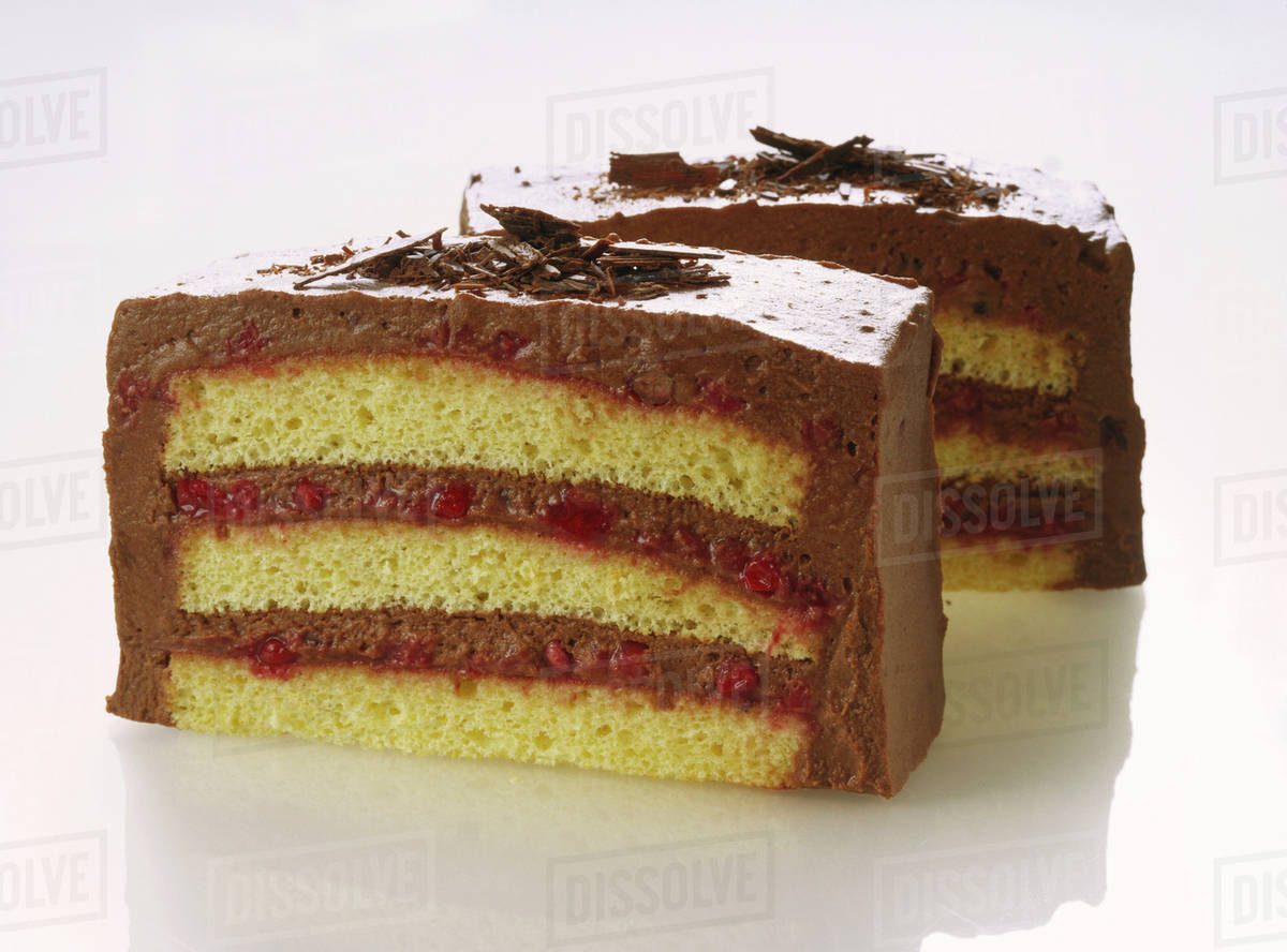 Sponge slices with chocolate cream and cranberries - Royalty-free Stock ...