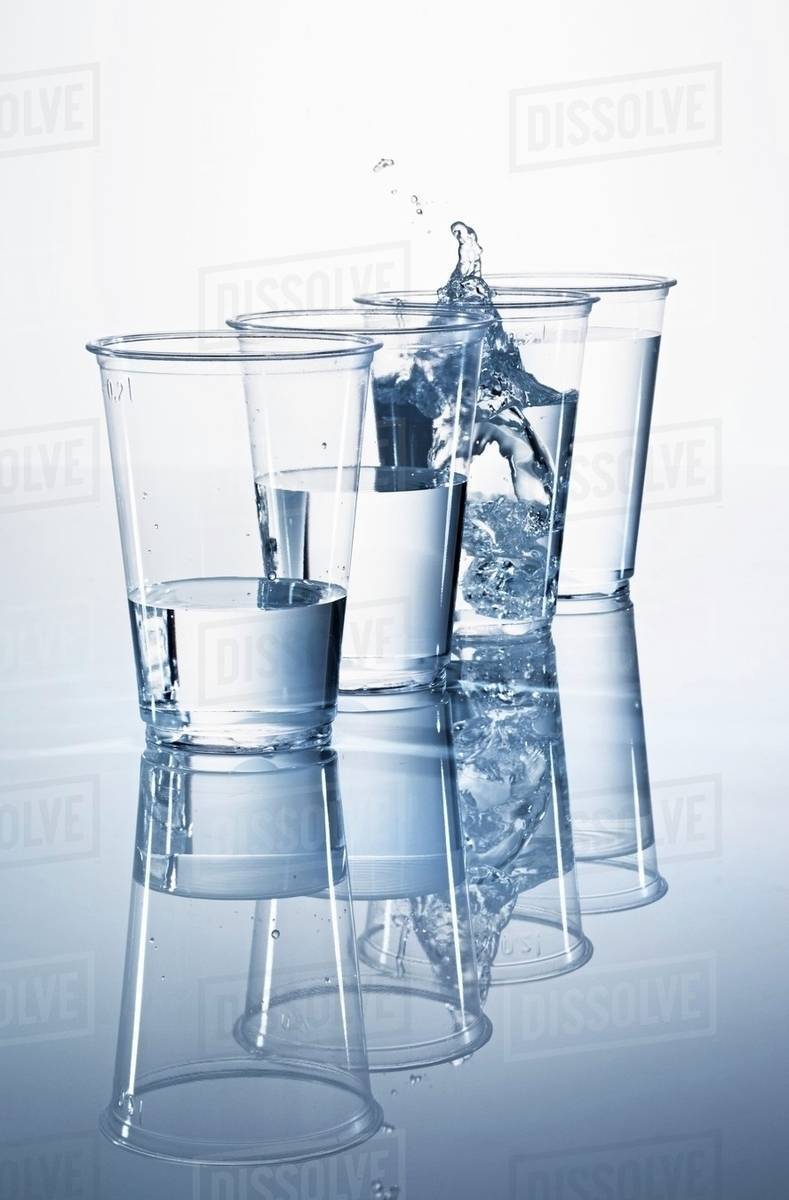 Plastic cups of water - Royalty-free Stock Photo | Dissolve