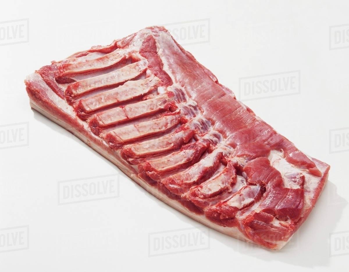 Pork belly with ribs removed - Royalty-free Stock Photo | Dissolve