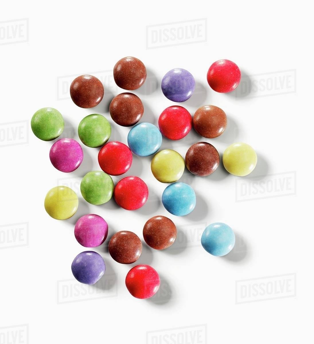 Coloured chocolate beans - Stock Photo - Dissolve