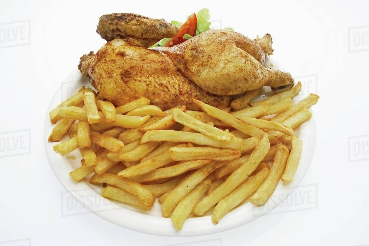 Half a chicken with chips - Royalty-free Stock Photo | Dissolve