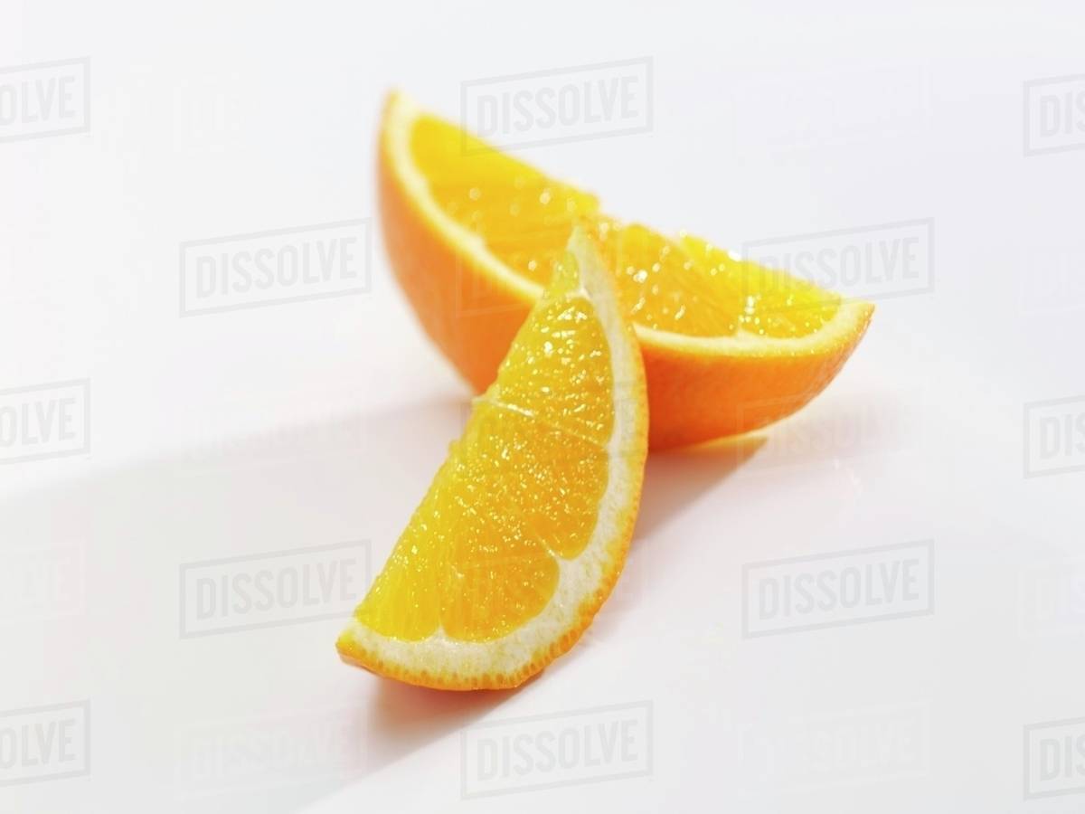 Two orange wedges - Royalty-free Stock Photo | Dissolve