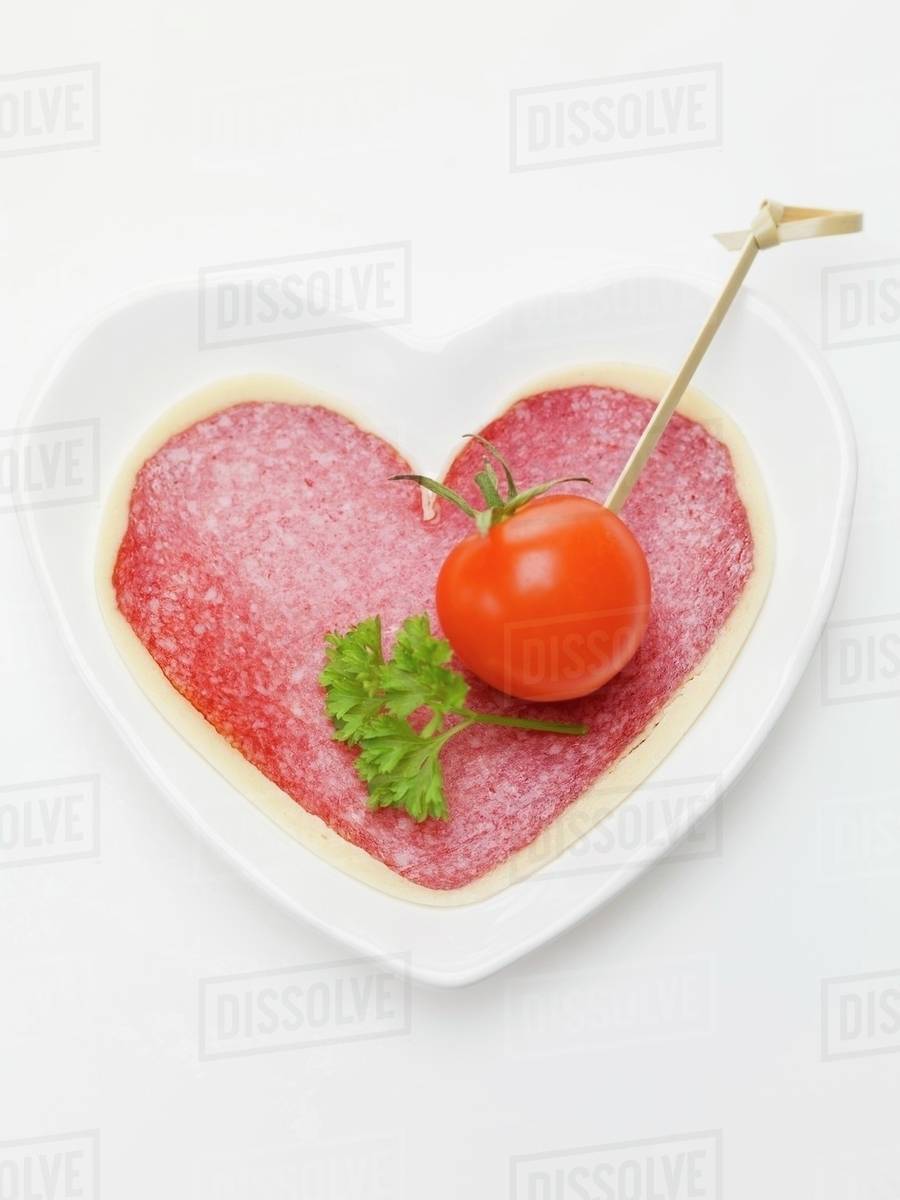 Salami and cheese heart with cherry tomato - Royalty-free Stock Photo ...