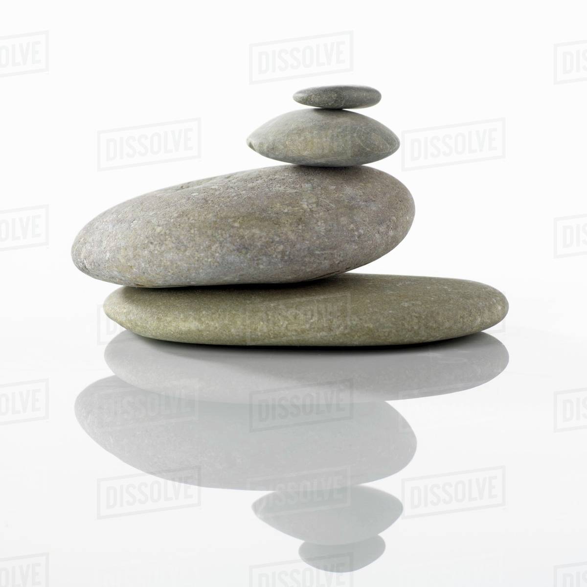 Pebbles of various sizes, stacked - Royalty-free Stock Photo | Dissolve