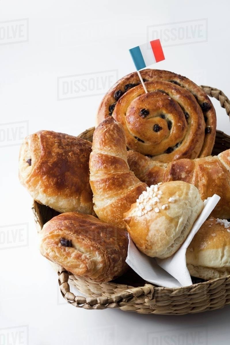 Sweet pastries with French flag in bread basket - Royalty-free Stock ...