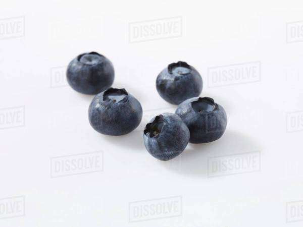 Five blueberries - Royalty-free Stock Photo | Dissolve