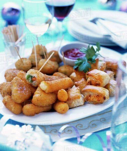 Platter of assorted appetisers - Royalty-free Stock Photo | Dissolve