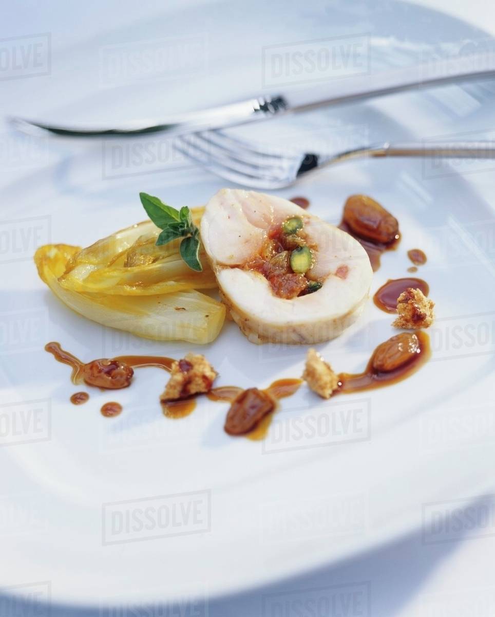 Stuffed loin of rabbit with caramelised chicory - Royalty-free Stock ...