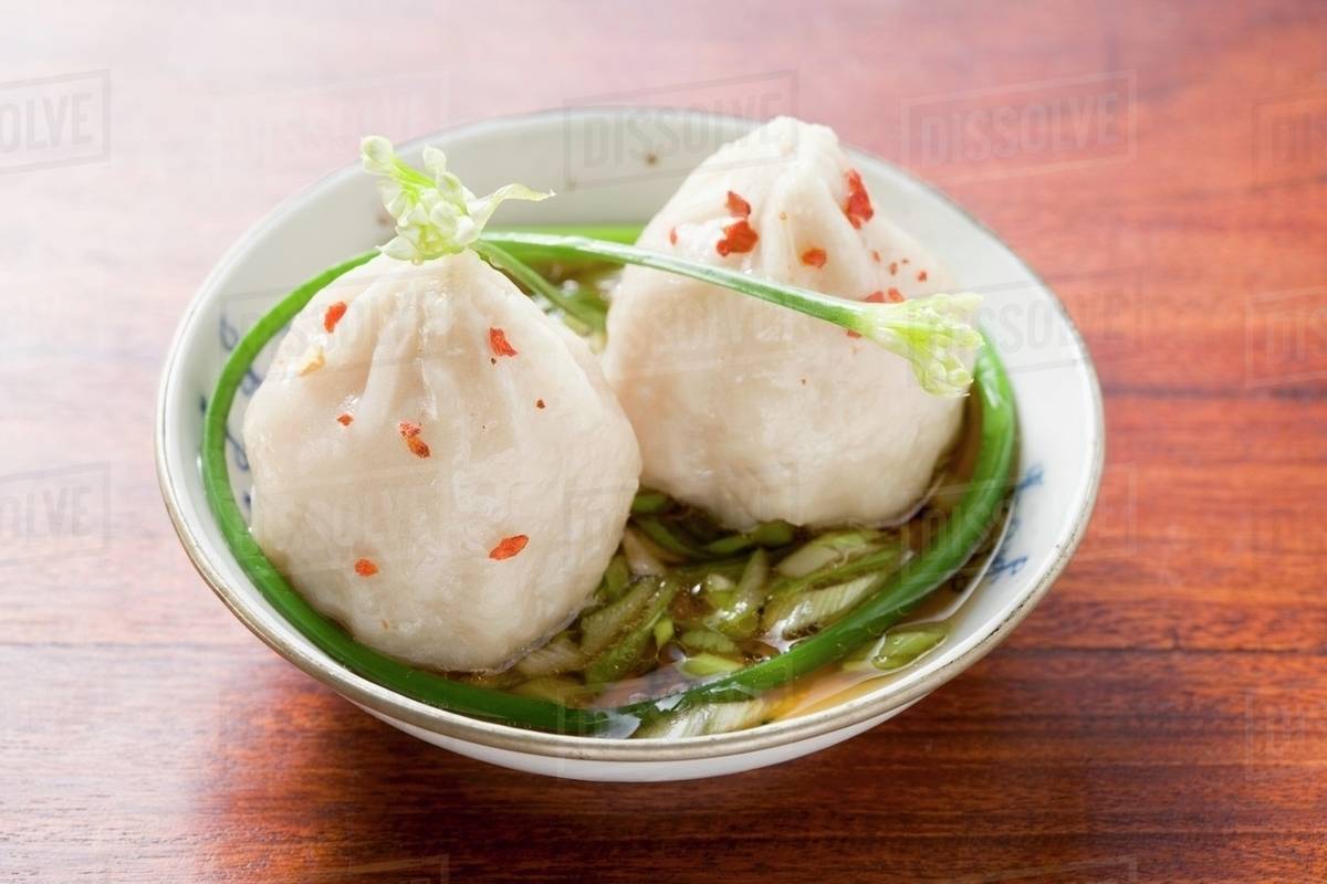 Dim sum in spicy sauce (Asia) - Royalty-free Stock Photo | Dissolve