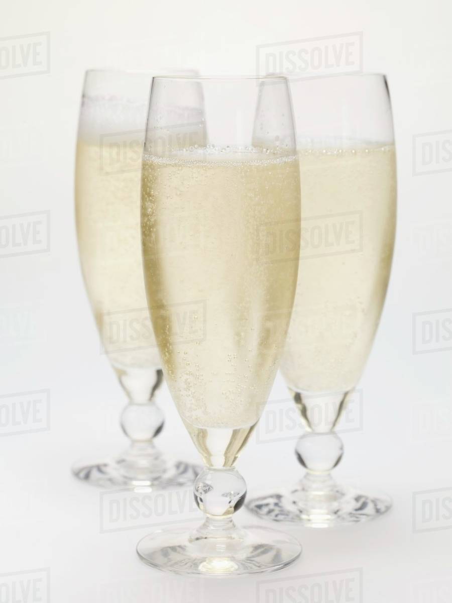 Three glasses of sparkling wine - Royalty-free Stock Photo | Dissolve