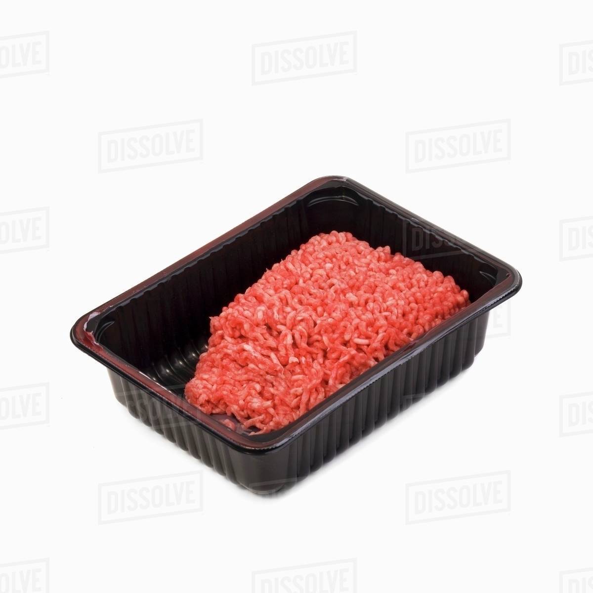 Minced beef in plastic container - Royalty-free Stock Photo | Dissolve