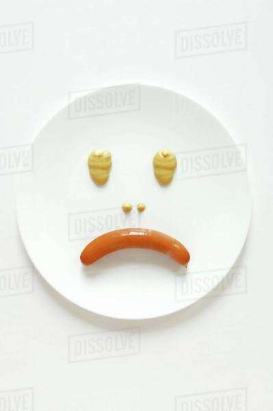 Frankfurter and mustard making a sad face - Royalty-free Stock Photo ...