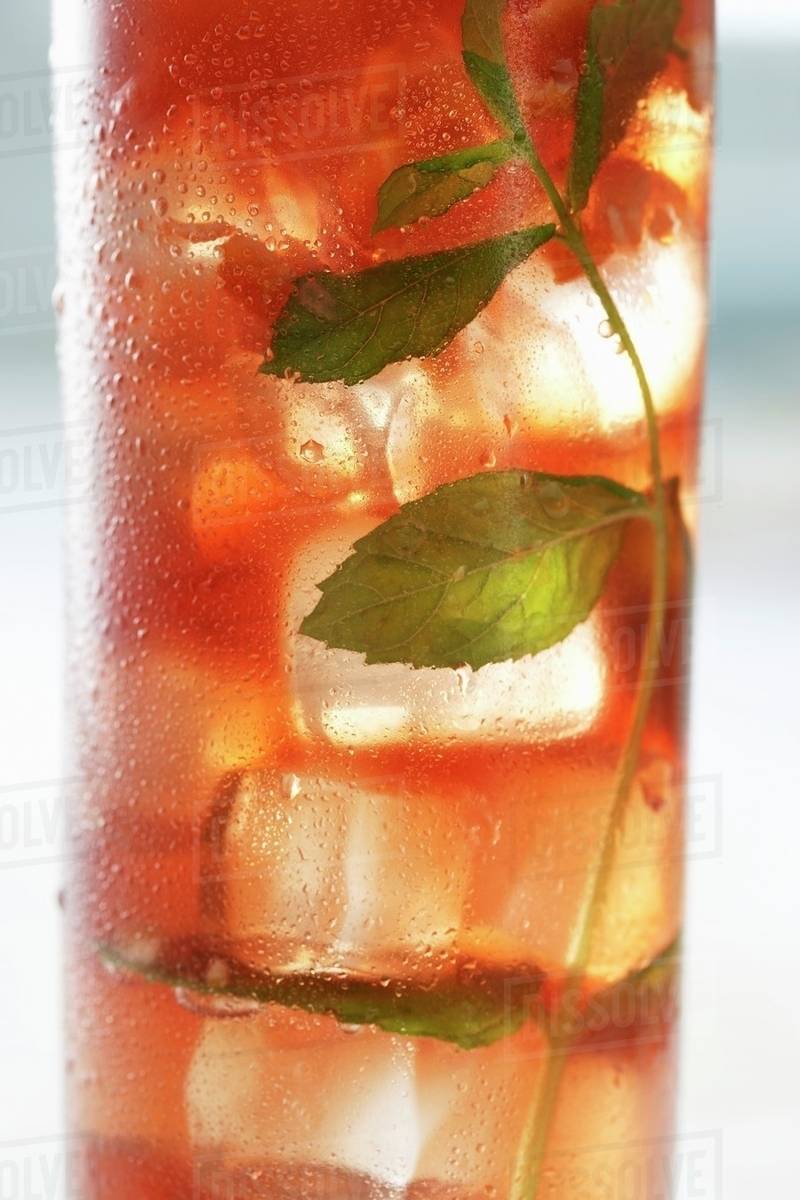 A glass of iced tea with mint - Royalty-free Stock Photo | Dissolve
