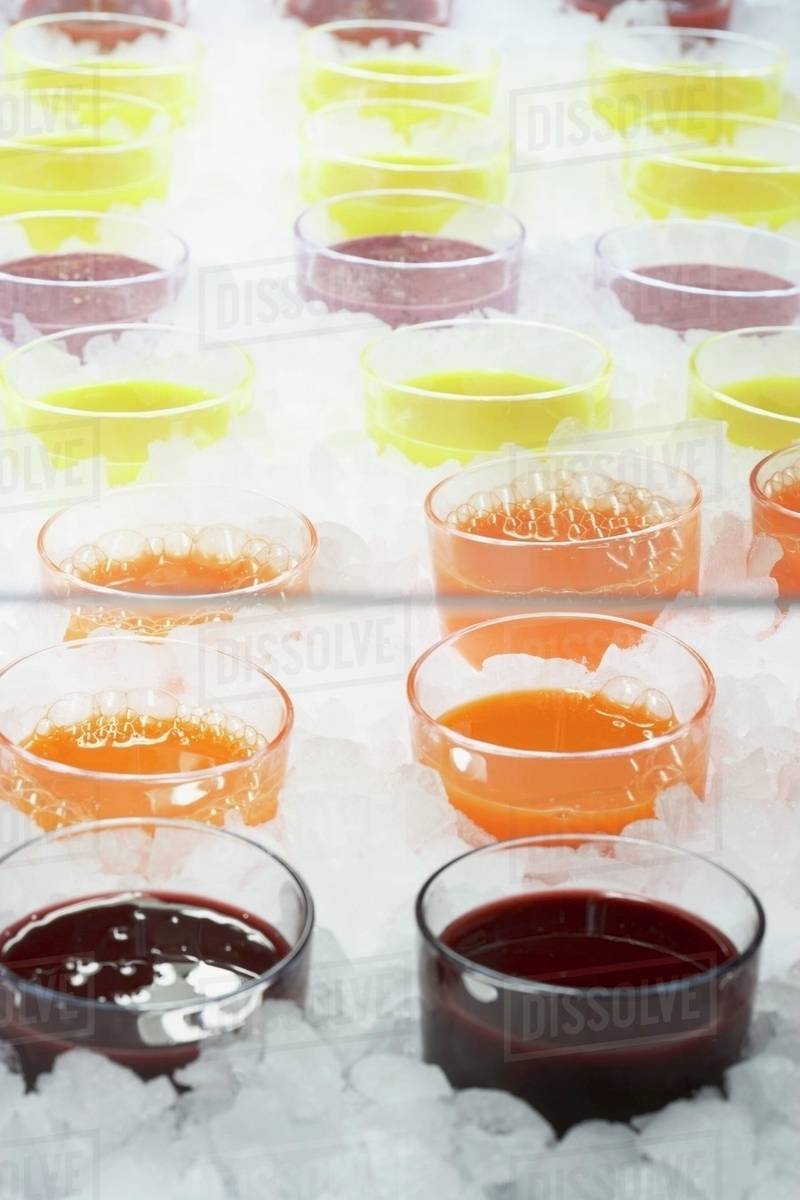 Assorted juices in ice - Royalty-free Stock Photo | Dissolve