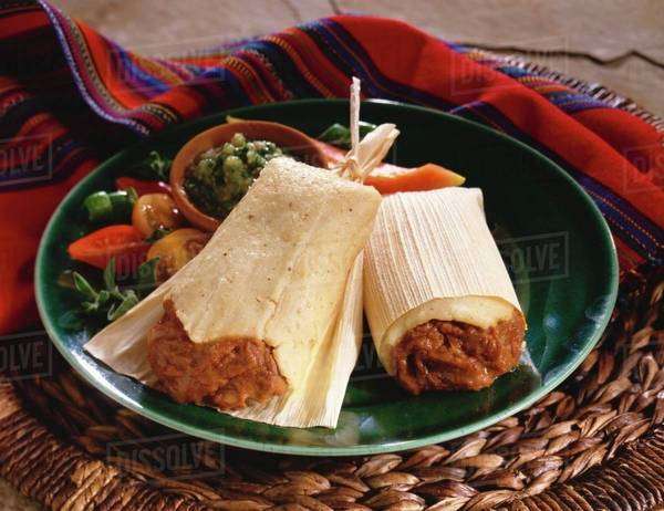 Tamale in Husk on a Plate - Royalty-free Stock Photo | Dissolve