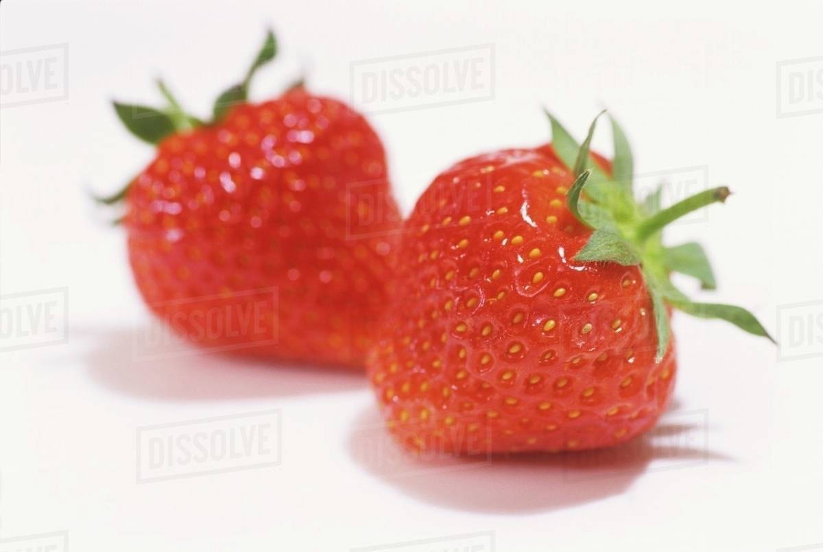 Two strawberries - Royalty-free Stock Photo | Dissolve