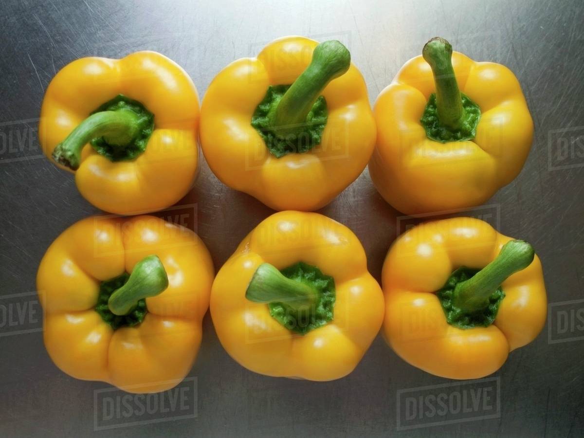 Six yellow peppers - Royalty-free Stock Photo | Dissolve