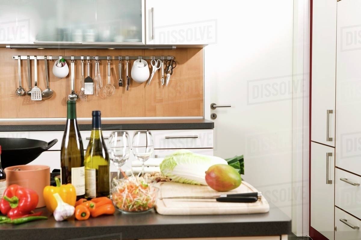 Various ingredients on work surface in a kitchen - Royalty-free Stock ...