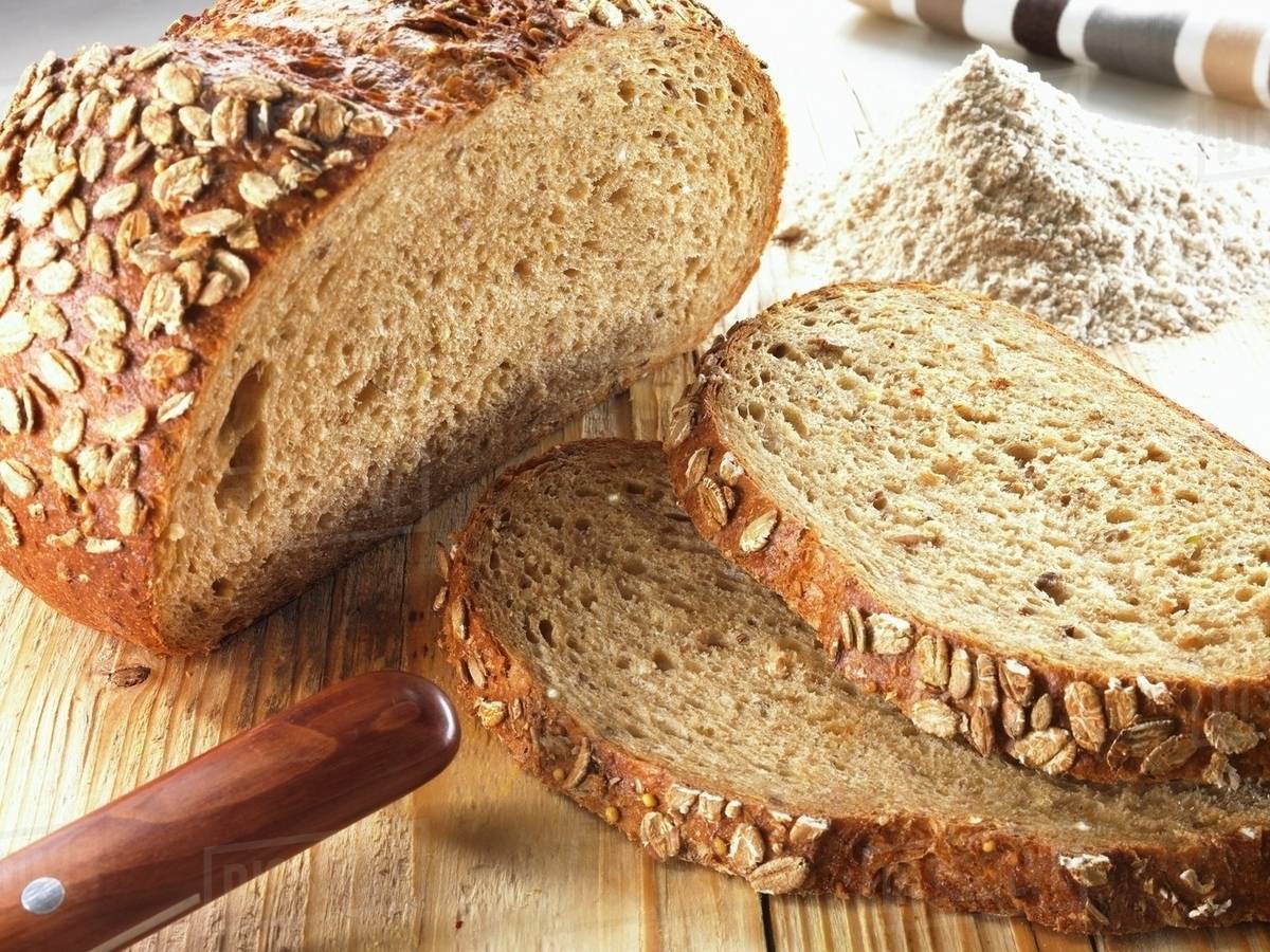 Organic six grain bread - Stock Photo - Dissolve