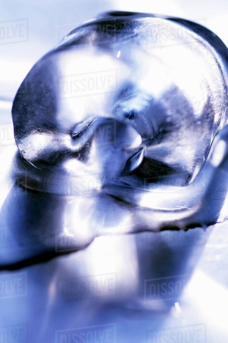 An ice cube - Stock Photo - Dissolve